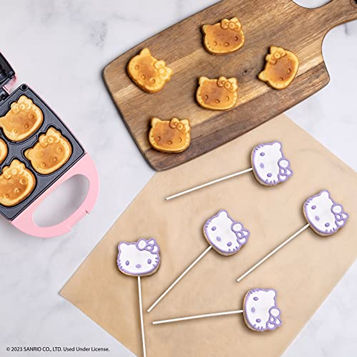 Uncanny Brands Hello Kitty Cake Pop Maker - Makes 4 Hello Kitty Cake Pops