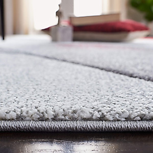 SAFAVIEH Hollywood Collection Area Rug - 5'3" x 7'6", Grey & Red, Mid-Century Modern Design, Non-Shedding & Easy Care, Ideal for High Traffic Areas in Living Room, Bedroom (HLW716Q)