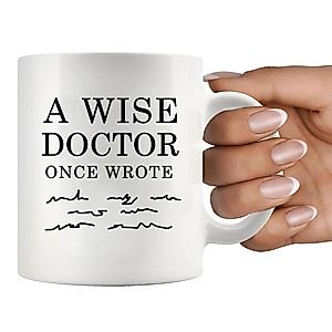 Panvola A Wise Doctor Once Wrote Funny Doctor Gifts Dr Mom Dad Husband Wife Boyfriend Girlfriend Graduation Gifts For New Physician Surgeon Medical Student MD Practitioner Ceramic Mug (11 oz, White)
