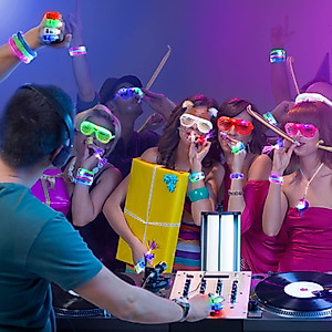 122 PCS Glow In The Dark Party Supplies Light Up Toy Party Favors with 12 Flashing Glasses LED Bracelets Flashing Hair Neon Peacock Finger Light LED Whistle Glow Hand Clappers and 50 Finger Lights