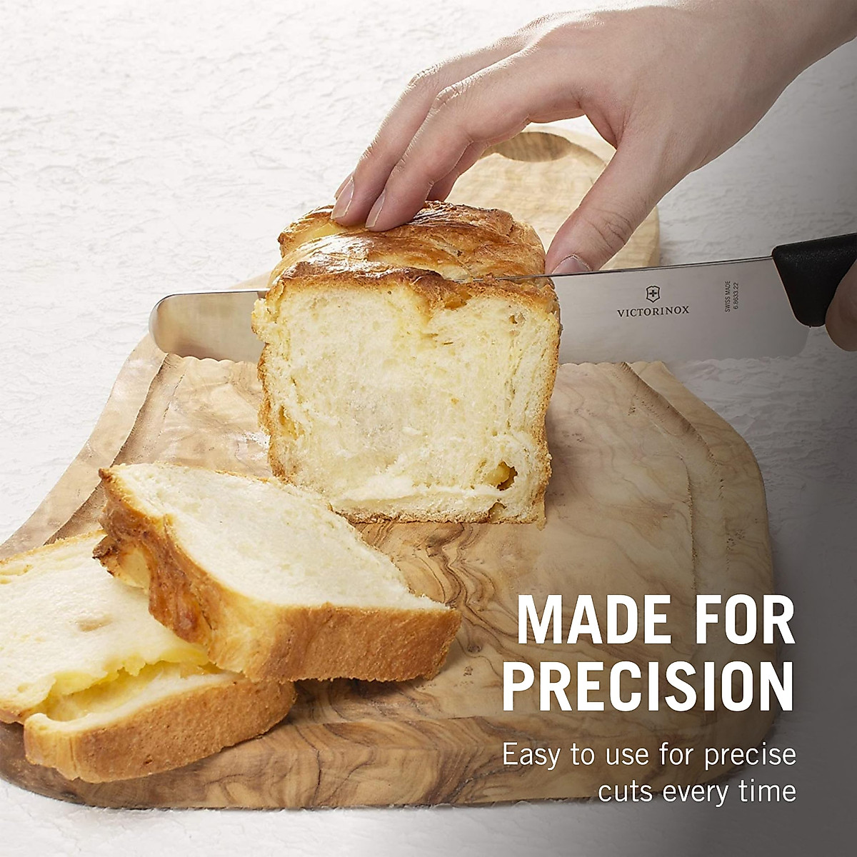 Victorinox Swiss Classic Bread Knife - Serrated Kitchen Knife for Home Essentials - Perfect for Cutting Bread, Fruit & Vegetables - Black Handle, Serrated Edge, 8.5"