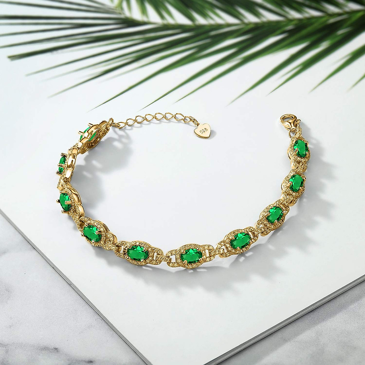 Gem Stone King 18K Yellow Gold Plated Silver Green Simulated Emerald Tennis Bracelet For Women (8.00 Cttw, Oval 6X4MM, 7 Inch With 1 Inch Extender)