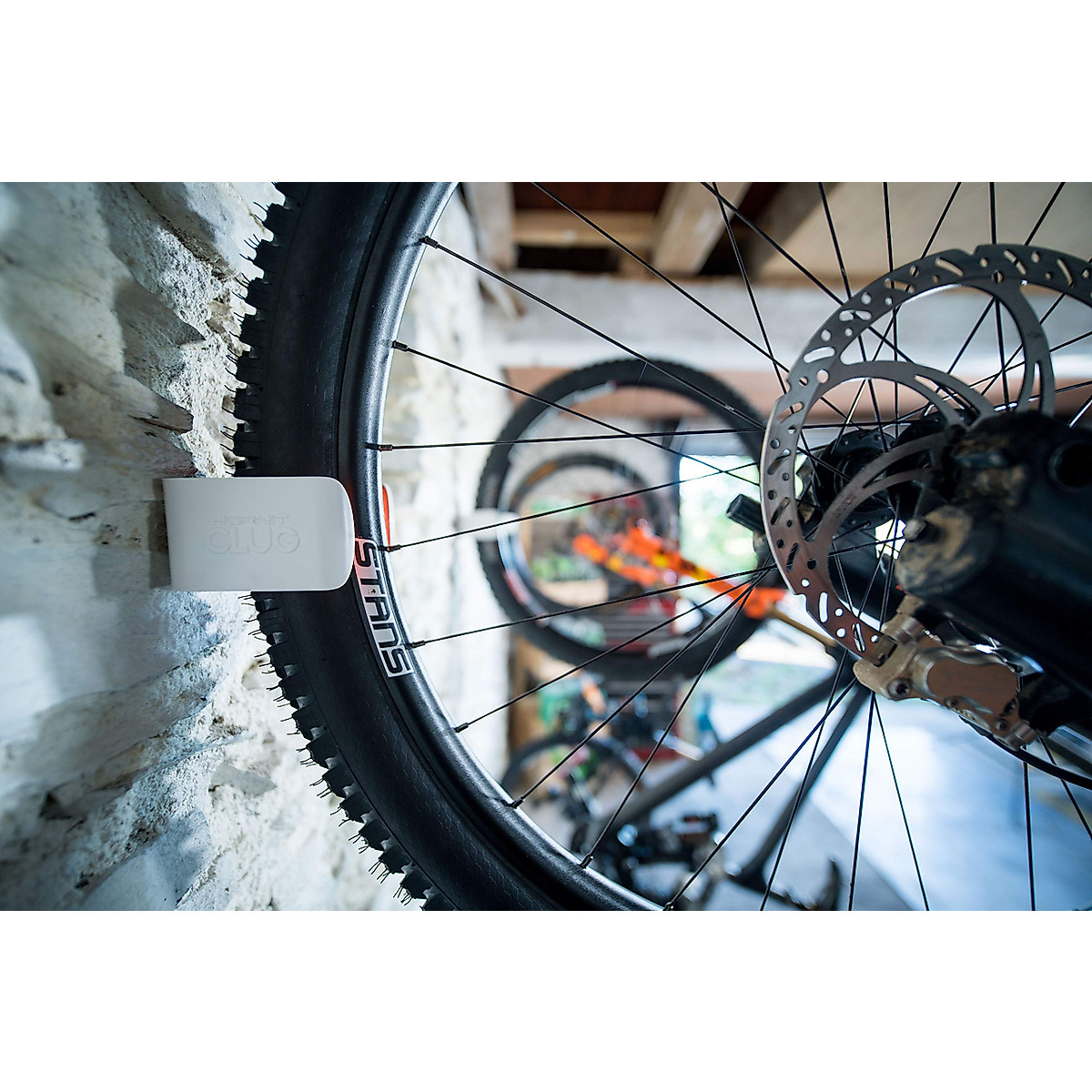 Hornit CLUG Bike Clip Storage Rack & Mount System - World’s Smallest Bike Rack for Indoor/Outdoor Bike Storage - Won't Damage Rims, Tires - Roadie Fits Tires 1" - 1.25" / 23-32mm - Black/Black