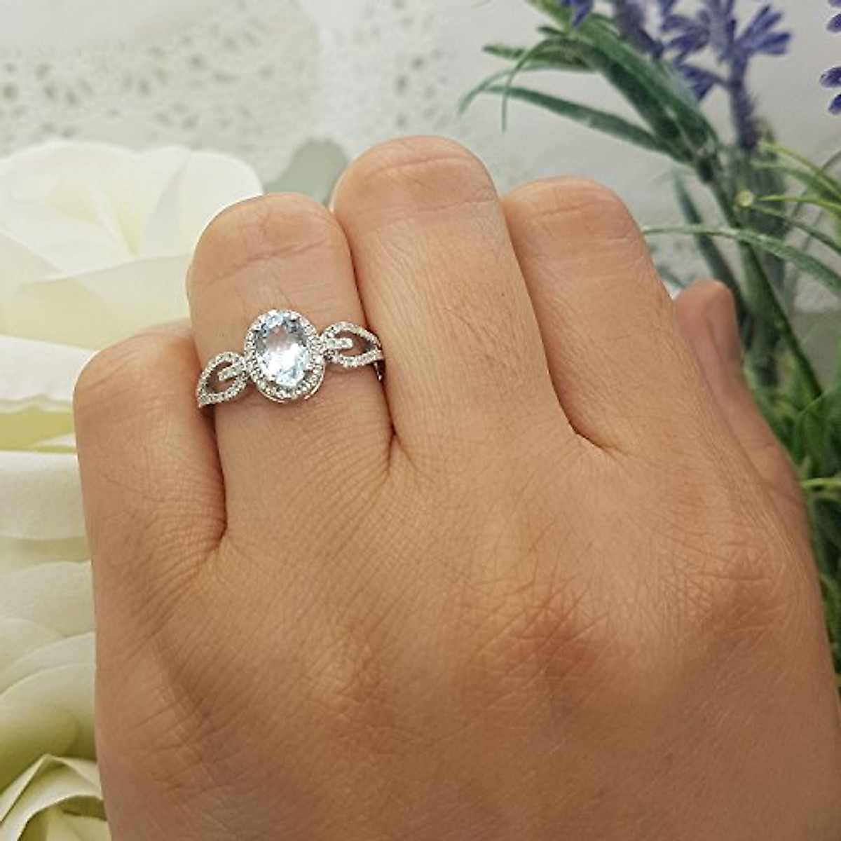 Dazzlingrock Collection Sterling Silver 7X5 MM Oval Aquamarine & Round White Diamond Bridal Halo Engagement Ring, Size 9