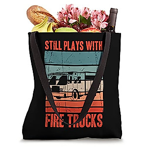 Still plays with Fire Trucks for funny Firefighter Tote Bag