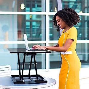 Stand Steady X-Elite Pro, Ergonomic Adjustable Height Standing Desk Converter for Home or Office, Easy Lift Sit to Stand Laptop Desk Riser for Laptop and Computer Monitor (Black, 28in x 20in)