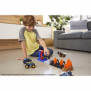 Hot Wheels Monster Trucks Fire Through Playset with 1:64 Scale Die-Cast 5-Alarm Toy Truck, Launcher & Spinning Flames