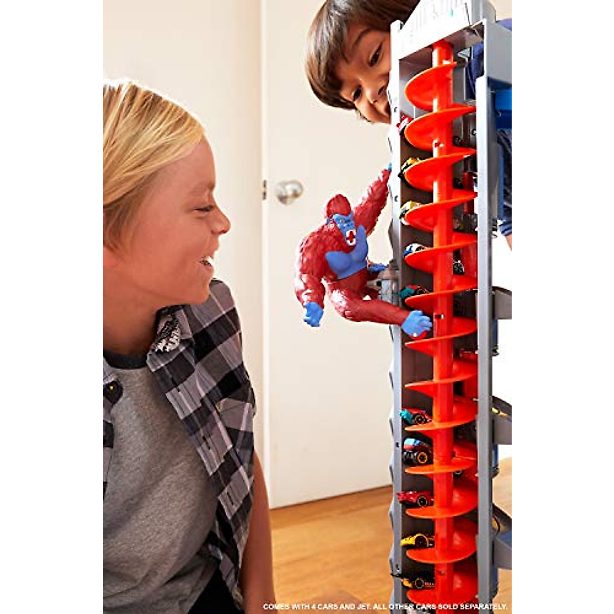 Hot Wheels Toy Car Track Set & 4 1:64 Scale Cars, Super Ultimate Garage, 3+ Ft Tall with Motorized Gorilla & Storage for 140 Cars