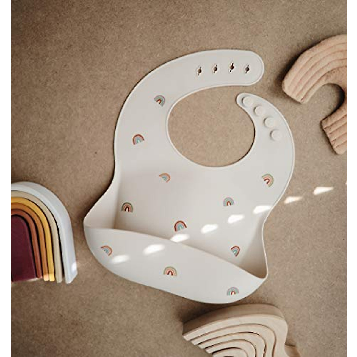 mushie Silicone Baby Bib | Adjustable Fit Waterproof Bibs (Rainbows)