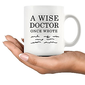 Panvola A Wise Doctor Once Wrote Funny Doctor Gifts Dr Mom Dad Husband Wife Boyfriend Girlfriend Graduation Gifts For New Physician Surgeon Medical Student MD Practitioner Ceramic Mug (11 oz, White)