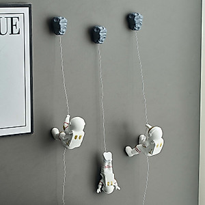 AWNR 3Pcs Climbing Astronaut Figurine Wall Hanging Decor Modern Home Decor Outer Space Theme Decorations Wall Sculptures Space Decor Background 3D Wall Decor for Bedroom Living Room Kids Room