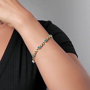 Gem Stone King 18K Yellow Gold Plated Silver Swiss Blue Topaz and Diamond Greek Vine 7 Inch Tennis Bracelet For Women