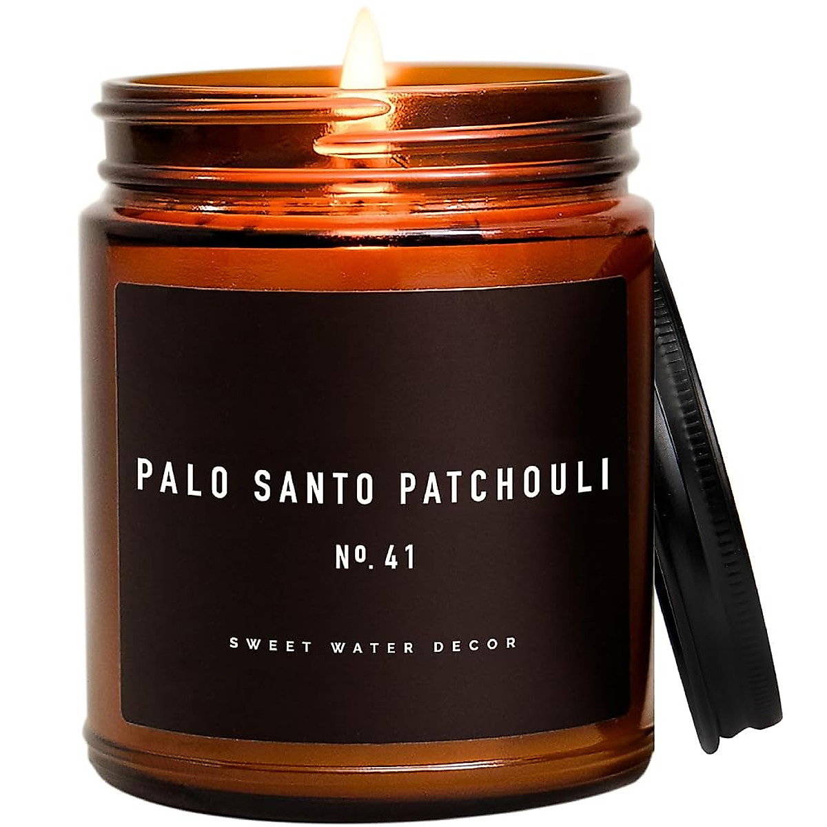 Sweet Water Decor Palo Santo Patchouli Candle - Vanilla, Musk, Sandalwood, Patchouli Scented Soy Spa Candles for Home - Gifts for Women, Men - 9oz Amber Jar, 40 Hour Burn Time