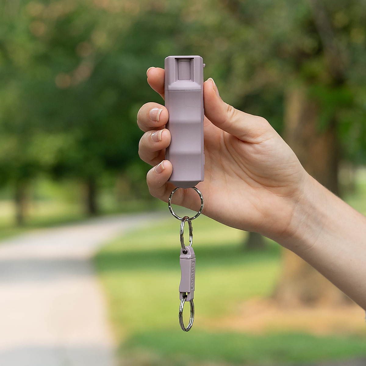 SABRE Pepper Spray, Quick Release Keychain for Easy Carry and Fast Access, Finger Grip for More Accurate and Faster Aim, Maximum Police Strength OC Spray, 25 Bursts, Secure and Easy to Use Safety