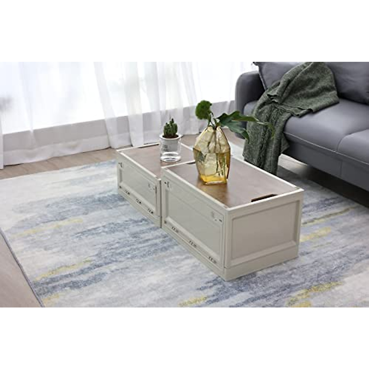 The foldable outdoor camping storage box has a large capacity of 40L, the foldable storage box equipped with a wooden cover and rollers can be used for indoor,car trunk and camping.