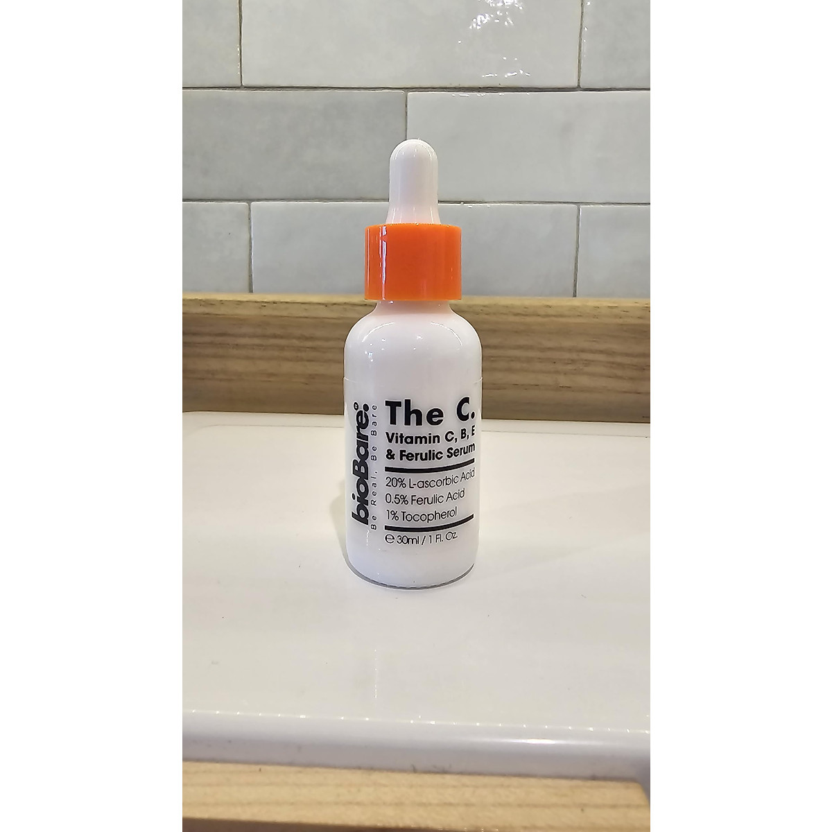 Vitamin C B E, and Ferulic Serum For Face By BioBare | 20% Pure Vitamin C W/Hyaluronic Acid | Helps Keep Skin Young, Moist, Bright & Glowing | Helps With Fine Lines, Wrinkles, Dark Spots | 1Fl Oz