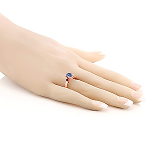 Gem Stone King 18K Rose Gold Plated Silver Persian Blue Moissanite and Red Rhodolite Garnet 3-Stone Engagement Ring For Women (0.98 Cttw, Round 6MM, Gemstone Birthstone, Size 9)