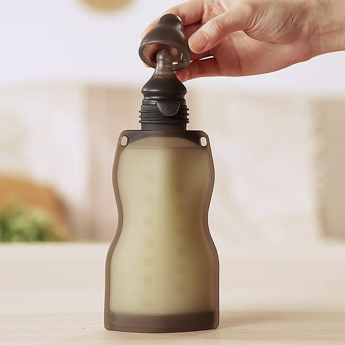 haakaa Silicone Breast Milk Storage & Feeding Bags (9oz,1pcs with Teat) - Soft & Washable Baby Feeding Pouch, Squeezable Baby Food Storage Bag for Self-Feed