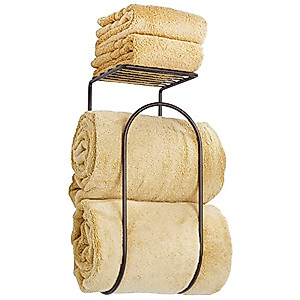 mDesign Modern Metal Wire Wall Mount Towel Rack Holder and Organizer with Storage Shelf - for Bathroom Towels, Washcloths, Hand Towels - Decorative Curved Design - Bronze
