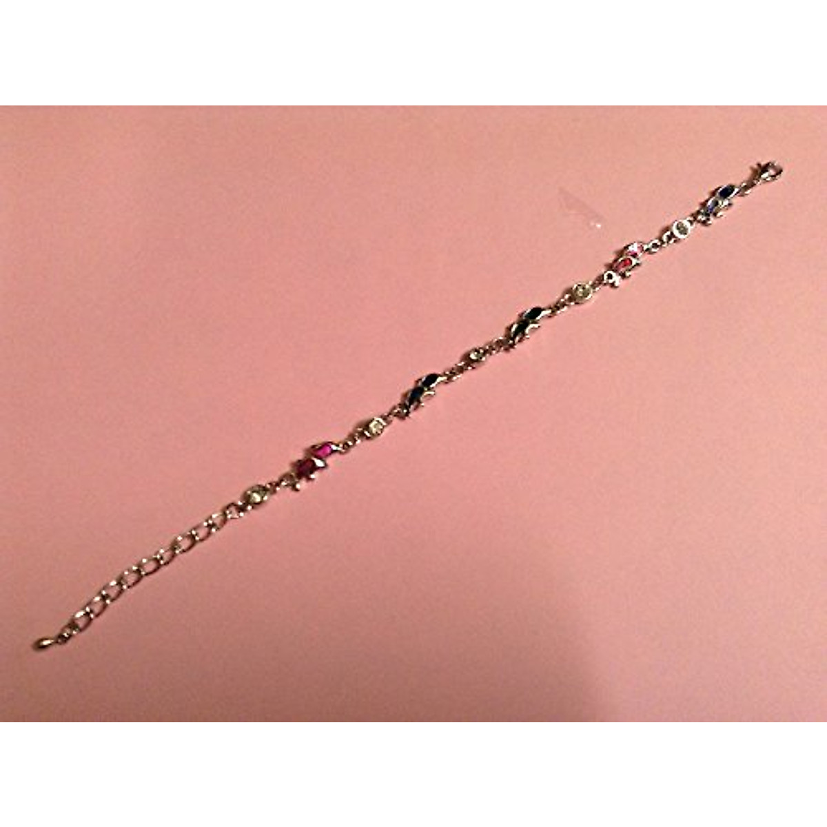 SHELL OF THE SEA, DOUBLE DOLPHIN PAUA SHELL & CZ STONE INLAYED BRACELETS