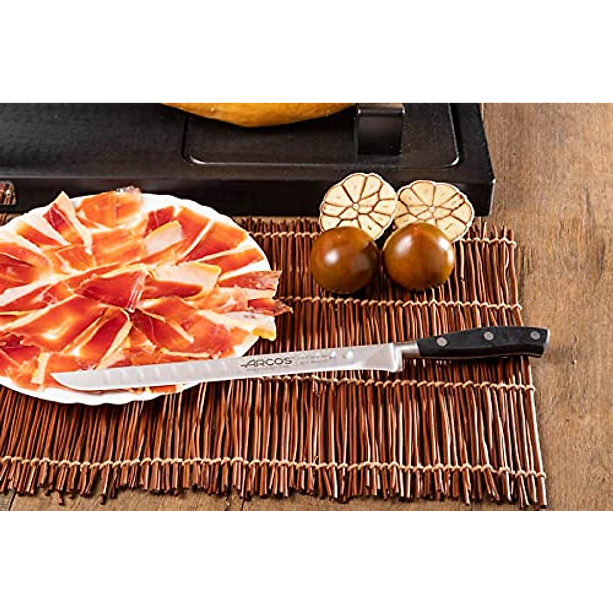 ARCOS Carving Knife 10 Inch Stainless Steel. Ham Slicer Knife for Cutting Ham and Meat. Ergonomic Polyoxymethylene Handle and 250mm Blade. Series Riviera. Color Black