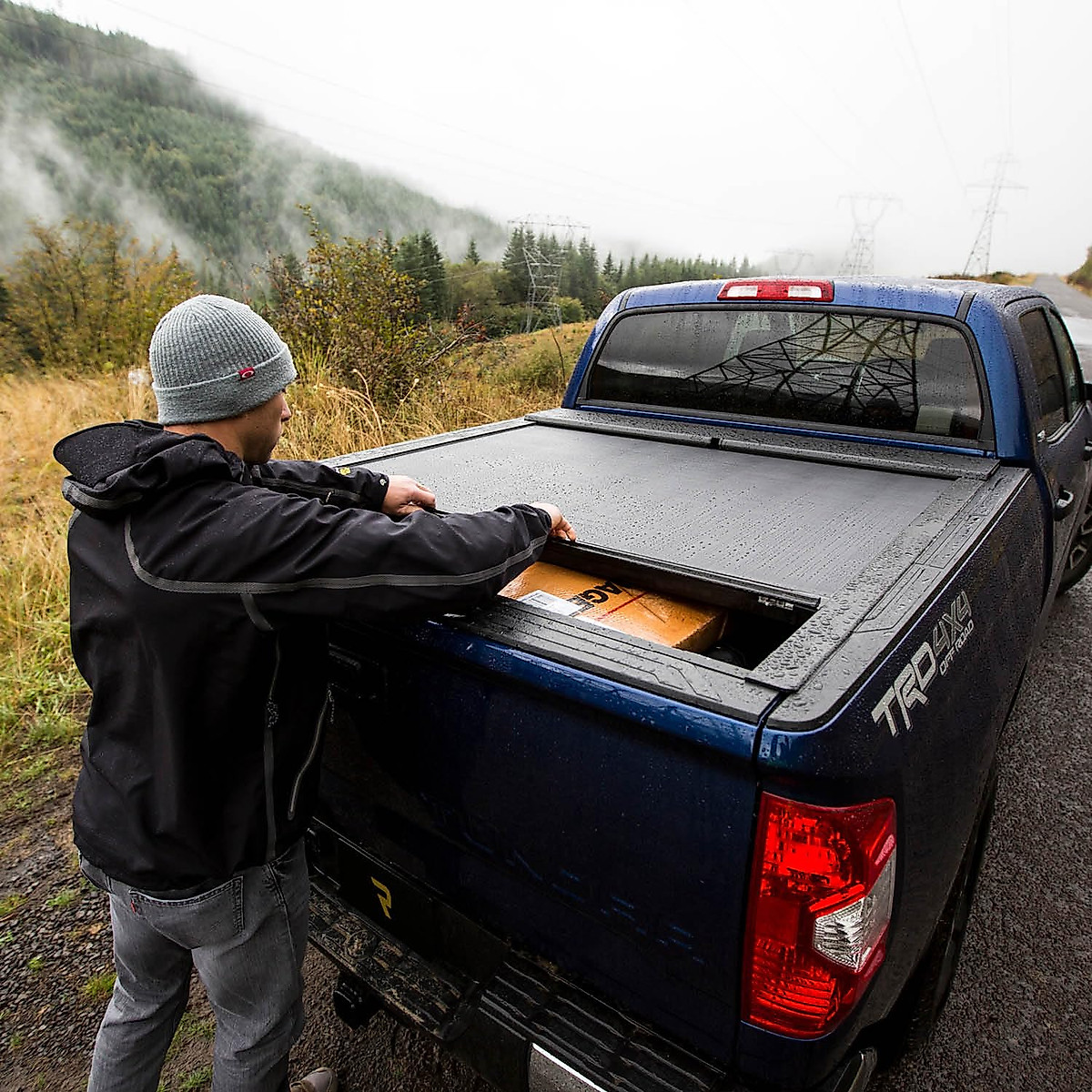 Roll N Lock M-Series Retractable Truck Bed Tonneau Cover | LG112M | Fits 2009 - 2014 Ford F-150 6' 7" Bed (78.8")