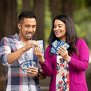 Pokemon TCG: Sun & Moon Team Up Collector's Tin Containing 4 Booster Packs and Featuring A Foil Celebi & Venusaur GX Card