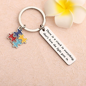 FUSTMW Autism Awareness Keychain Gift Puzzle Piece Charm Autism Mom Inspirational Gift for Autistic Teen There is a crack in everything that is how the light gets in (silver)