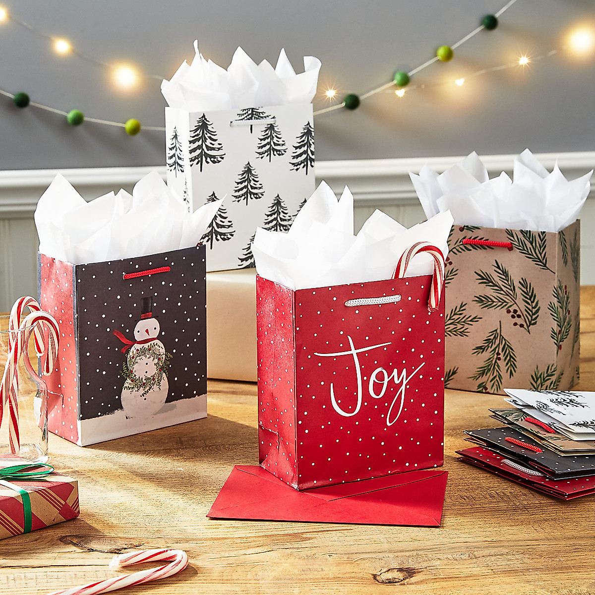 Hallmark 6" Small Holiday Gift Bags (8 Bags: Winter Foliage, Rustic Snowman, "Joy" on Red, Black and White Trees) for Gift Cards, Winter Wedding Party Favors, Teacher Presents