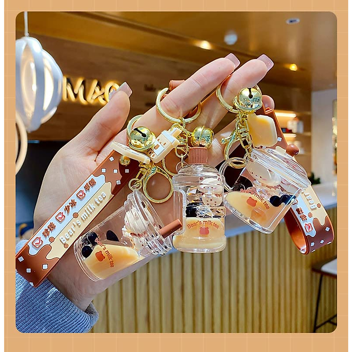 HSYHERE Men Women Creative Interesting Floating Milk Tea Brown Bear Lucky Bottle Keychain Keyrings. Bubble Tea Bear Moving Liquid Sand Car Key Chain Bag Pendant Decoration Holder - Cup.