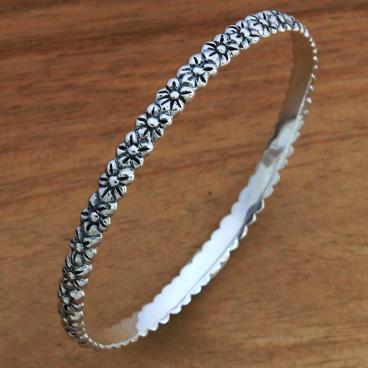 NOVICA Artisan Handcrafted Sterling Silver Bangle Bracelet Artisan Floral No Stone Indonesia [0.2 in W] ' Silver Garland'