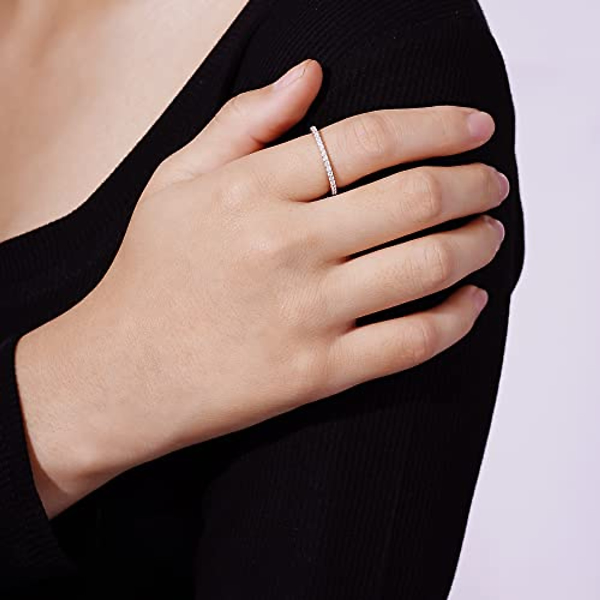 Amazon Essentials Platinum-Plated Sterling Silver Infinite Elements Cubic Zirconia Clear Round Cut Eternity Band Ring, Size 7, (previously Amazon Collection)