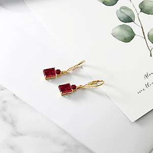 Gem Stone King 18K Yellow Gold Plated Silver Red Created Ruby Dangle Earrings For Women (6.10 Cttw, Gemstone July Birthstone, Emerald Cut 9X7MM)