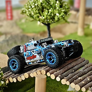 WLtoys 2.4G 4WD 1/28 30KM/H Brushed RC Monster Truck Off-Road Full Proportional Remote Control Car with LED Lights, RC Transmitter And Car Battery - RTR RC Toy Vehicle (RC Cars, RC Truck) (HELIDIRECT)