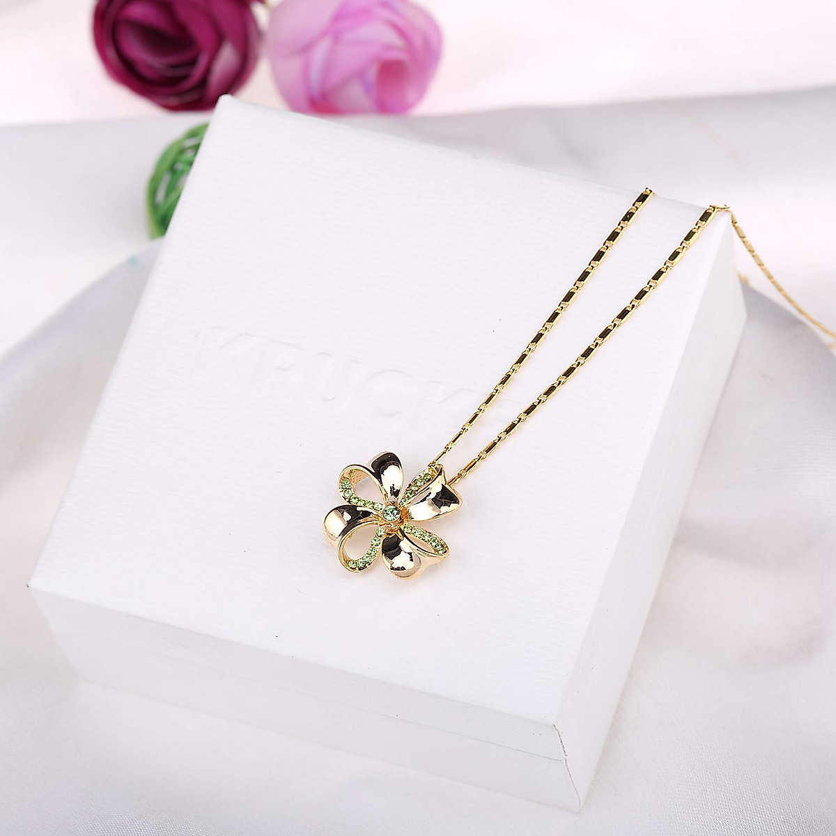 KRUCKEL Four Leaf Clover Necklace - Champagne Gold Lucky Flower with Vibrant Green Austrian Crystal Pendant, Jewelry for Women, Easy - Wear Fashion Aesthetic Design Accesory