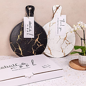 Round marble ceramic cutting board. Marble trivet in white or black with gold veins and leather chord. Cheese serving tray slab to display with kitchen accessories. Vanity tray for countertop. (White)