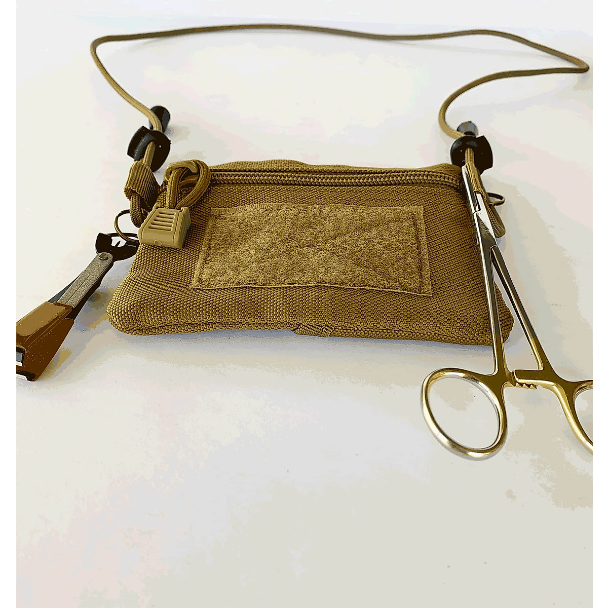 River Canyon - Pouch Lanyard with Nippers - This Fly Fishing Lanyard has a Water-Resistant Zipper Pouch, Nippers are Also Included. There is a Loop to Hang Your hemostat. Two More Rings to Hang Tools