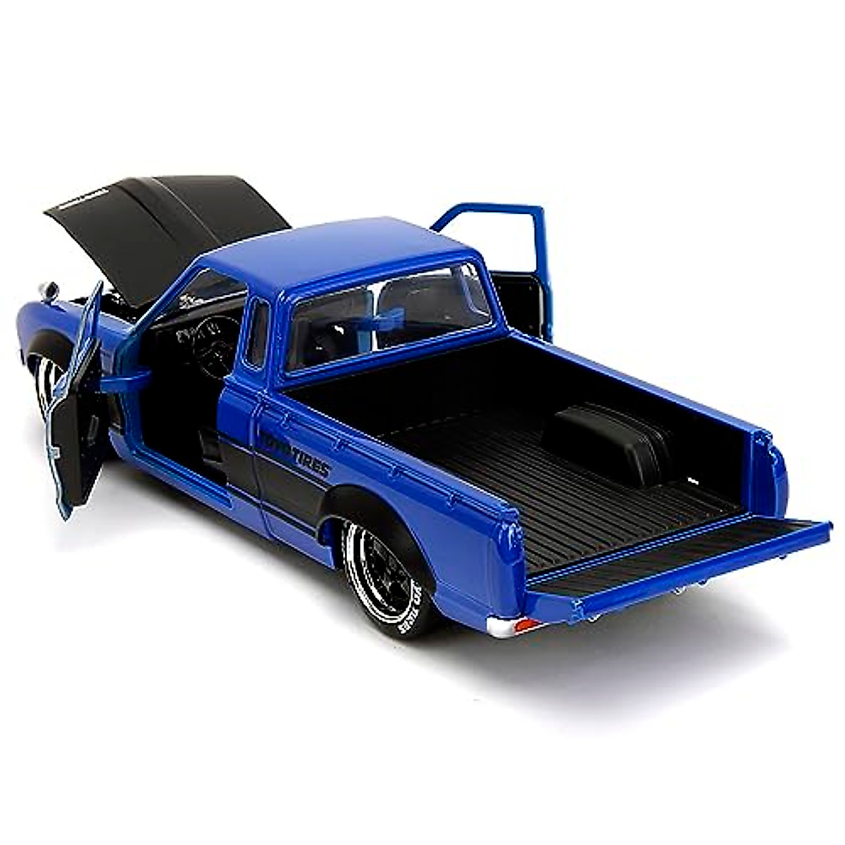 1972 Datsun 620 Pickup Truck #72 Blue Metallic with Black Stripes and Hood Toyo Tires with Extra Wheels Just Trucks Series 1/24 Diecast Model Car by Jada 34193