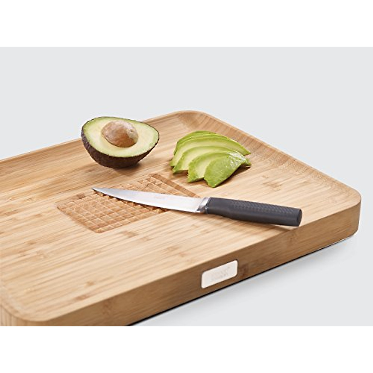 Joseph Joseph Cut & Carve Bamboo Cutting Board with Food Grip and Angled Surface Yellow Large