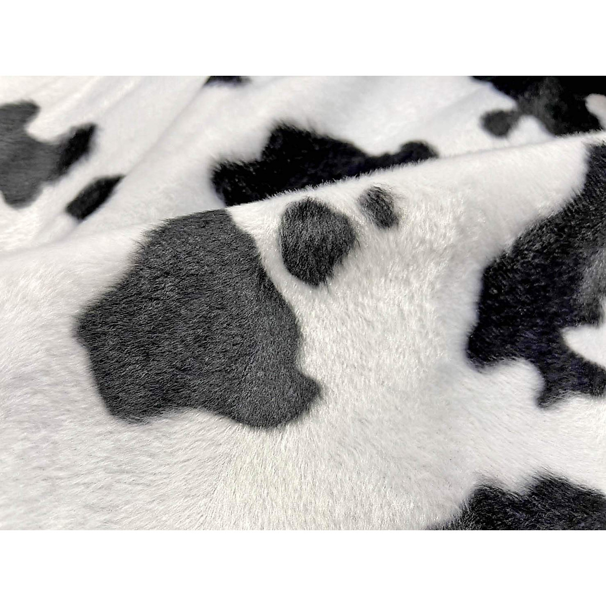AMORNPHAN 58” Wide 100% Polyester Cow ฺHide Bull Ox Pattern Animal Print Short Pile Smooth Faux Fur Velboa S-Wave Fabric Craft Cloth Kid Sewing Crafting Decorative Pillow Covers for 1 Yard (Cow)