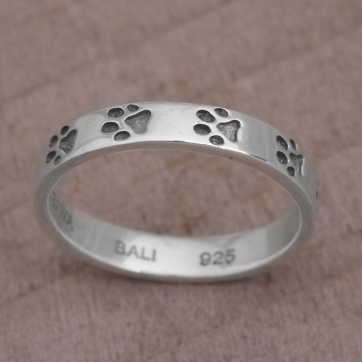 NOVICA Artisan Handmade Sterling Silver Band Ring Paw Print Motif from Bali No Stone Indonesia Animal Themed Modern Dog [band Width 4 mm W] ' Paw Prints'