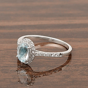 925 Sterling Silver Oval 1.25 Ctw Aquamarine Gemstone Women's Solitaire White Accents Engagement Ring Size_7