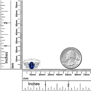 Gem Stone King 10K White Gold Blue Created Sapphire White Topaz and Diamond Accent 3 Stone Engagement Ring For Women (2.65 Cttw) (Size 8)