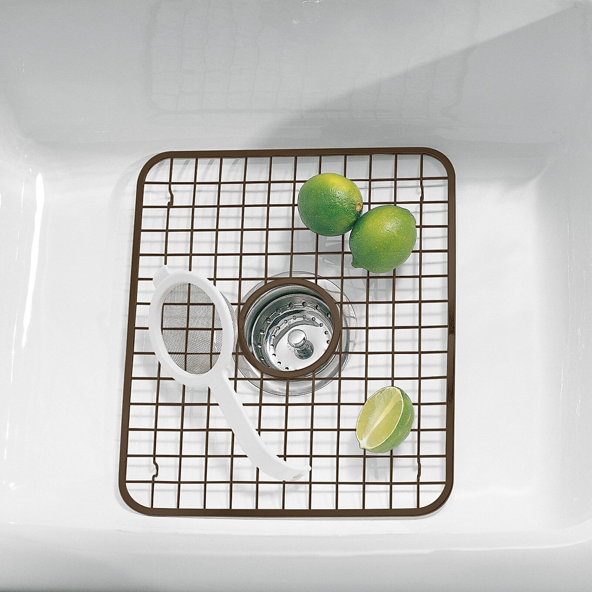 mDesign Modern Kitchen Sink Metal Dish Drying Rack/Mat with Center Drain Hole - Steel Wire Grid Design - Allows Wine Glasses, Mugs, Bowls and Dishes to Drain in Sink - 2 Pack - Bronze