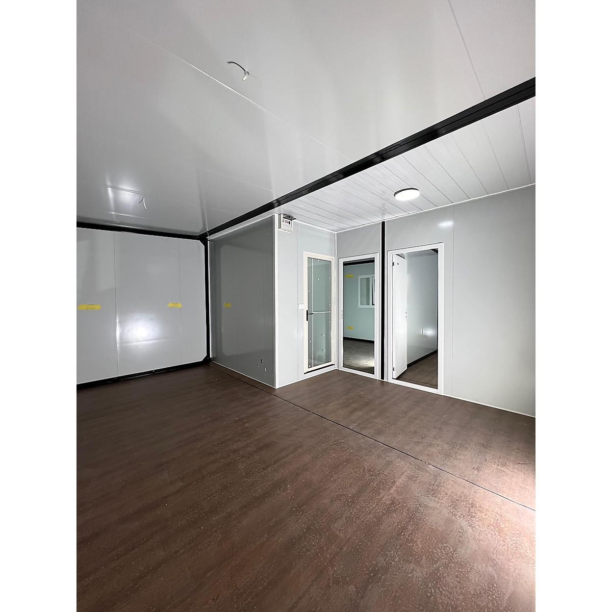 Prefabricated Modular Home with 2 Bedrooms, 1 Kitchen with Well furnished, 1 Bathroom with Exhaust Fan, 1 Living Room with Windows and Glass Doors, Sections