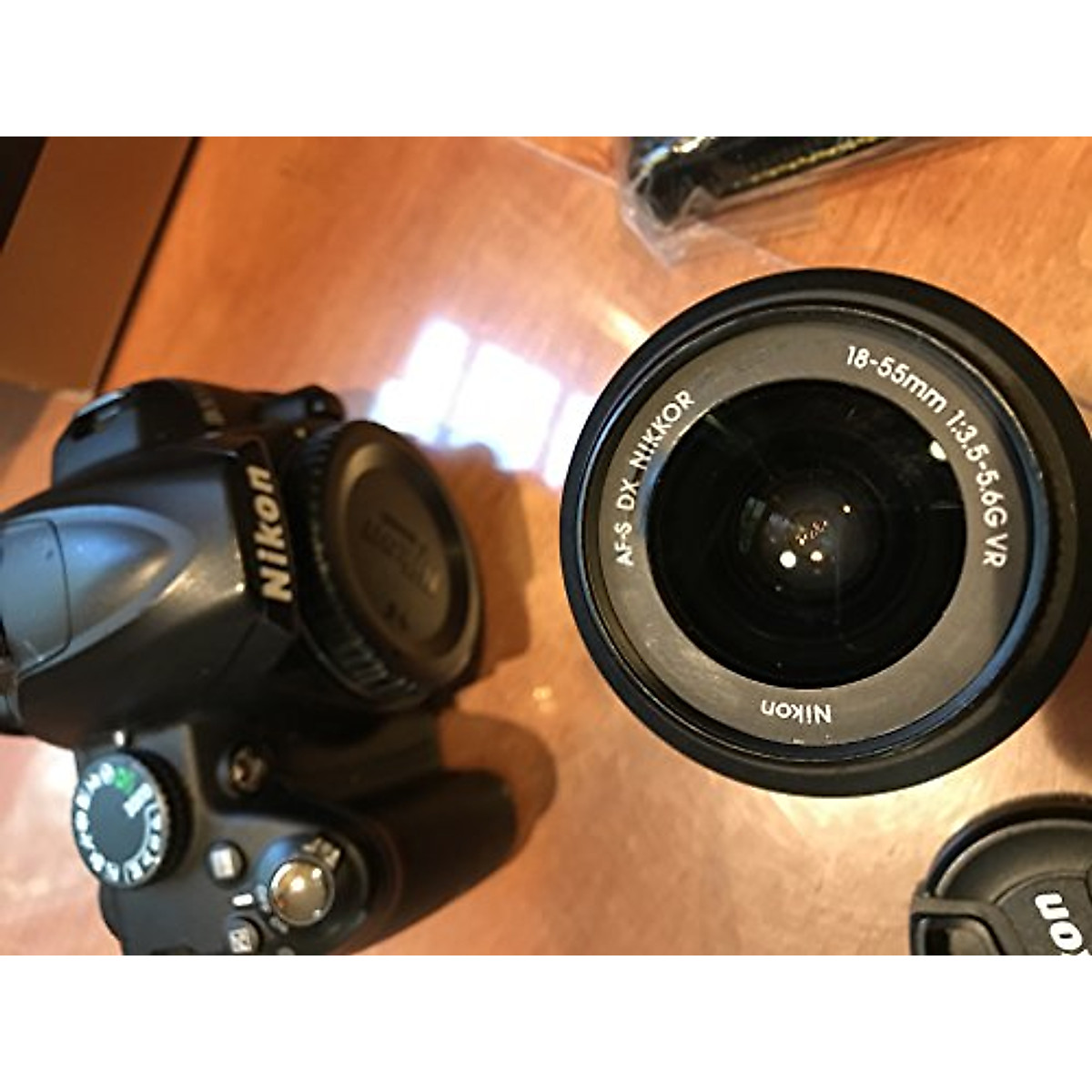 Nikon D3000 10MP Digital SLR Camera with 18-55mm f/3.5-5.6G & 55-200 AF-S DX VR Nikkor Zoom Lenses