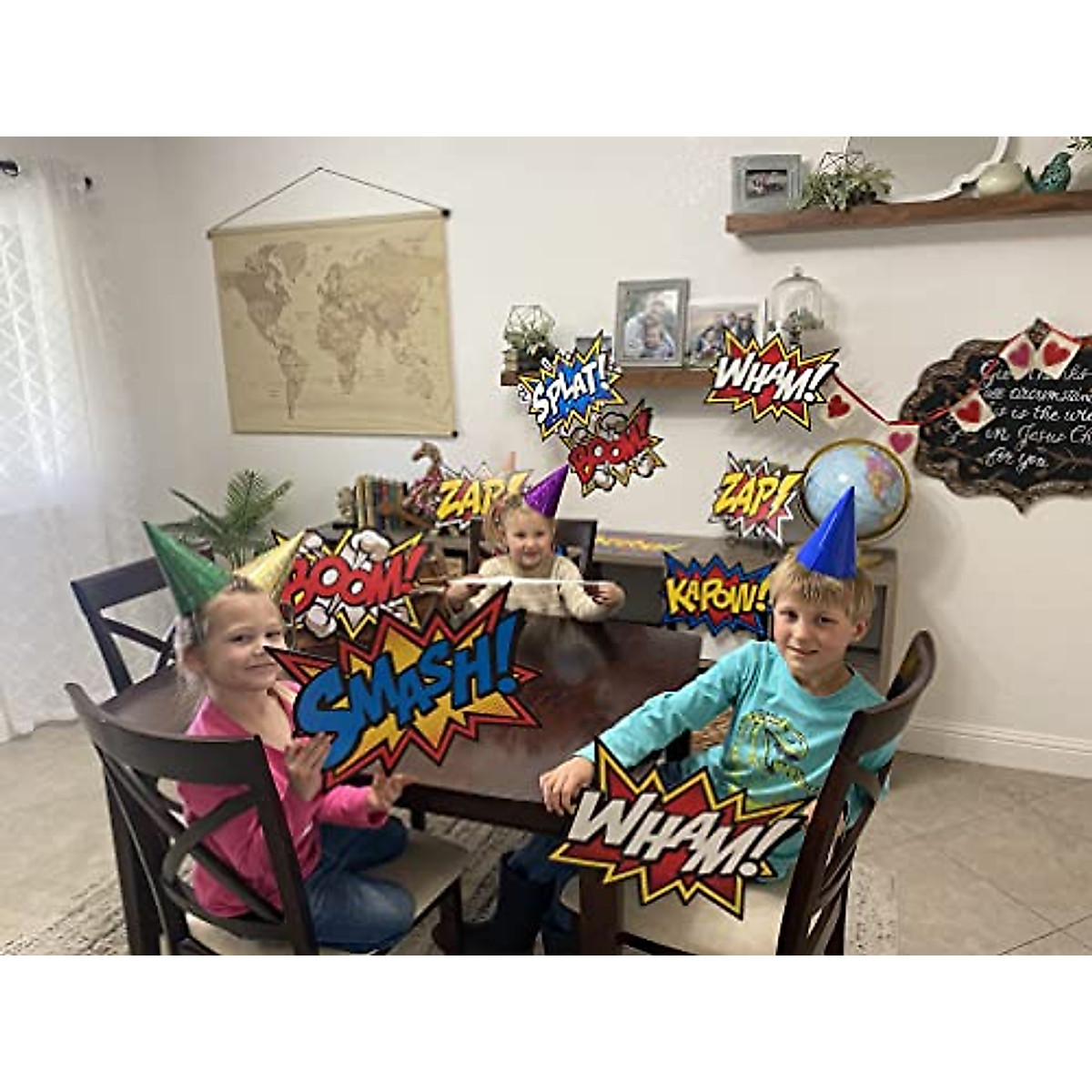 Bigtime Signs XL Superhero Backdrop with 6 Comic Action Word Photo Booth Props - Compliments Any Superhero Party Decorations - 4 x 6 ft - Cityscape Superhero Birthday Decorations Hangs on Wall Easily