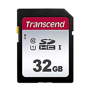 Minolta MN53 Digital Camera (Red) + 32GB SD Memory Card + Tri-fold Memory Card Wallet + Table Tripod Hand Grip + Hi-Speed SD USB Card Reader