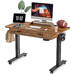 FEZIBO Adjustable Height Electric Standing Desk with Double Drawer, 55x 24 Inches Stand Up Home Office Desk with Splice Tabletop, Black Frame/Fir Brown Top