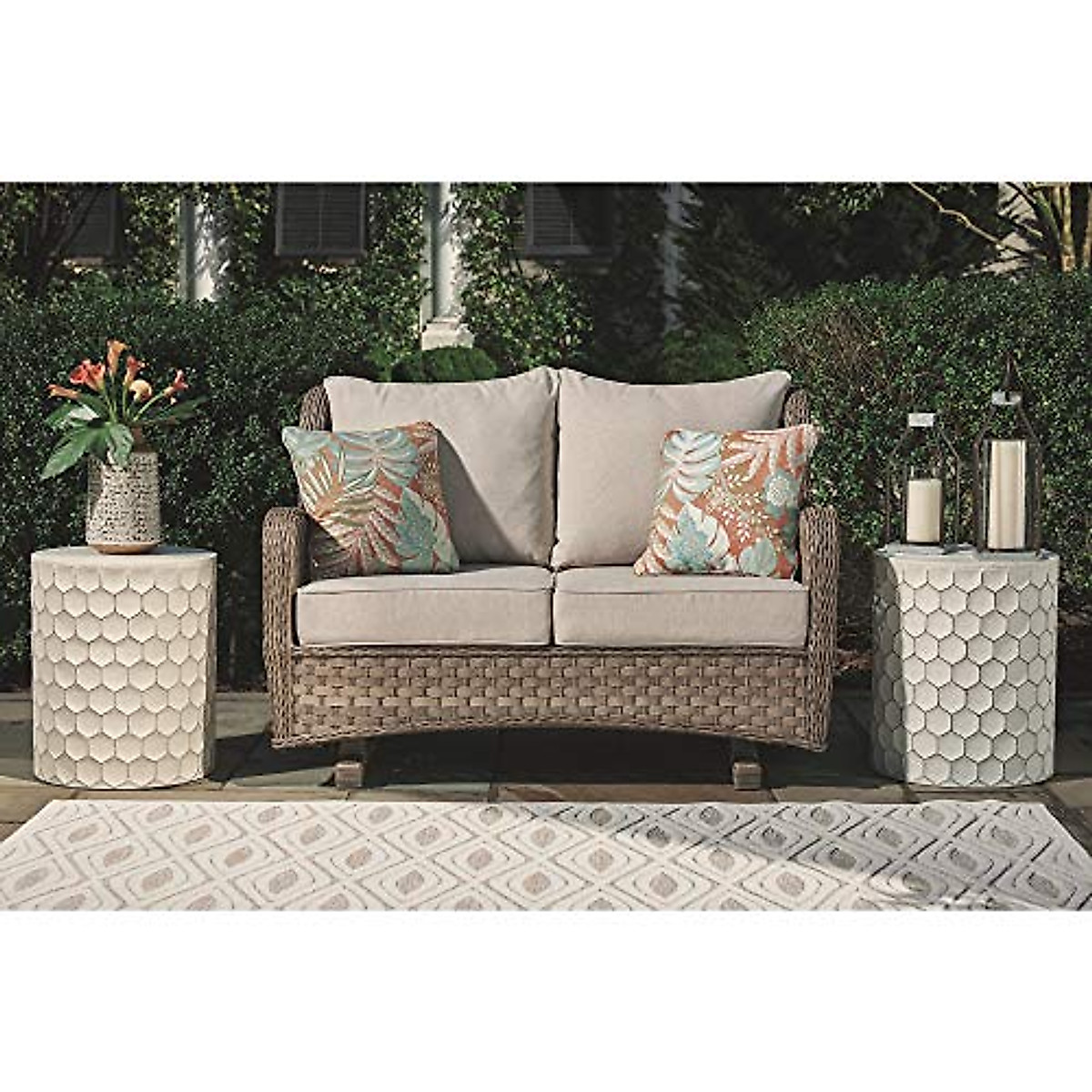 Signature Design by Ashley Clear Ridge Outdoor Handwoven Wicker Cushioned Loveseat Glider with 2 Throw Pillows, Light Brown